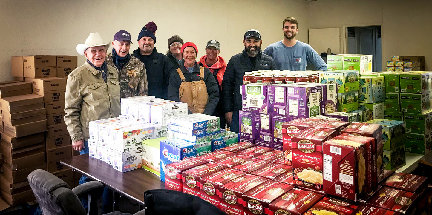 Mortenson staffers gather, donate to Spur food bank | The Texas Spur